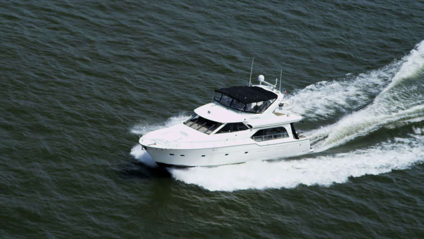 Aerial View Fast Motor Cruiser Ocean Cruising - Aerial Close Up View Of ... Aerial View Fast Motor Cruiser Ocean Cruising - Aerial Close Up View Of ...