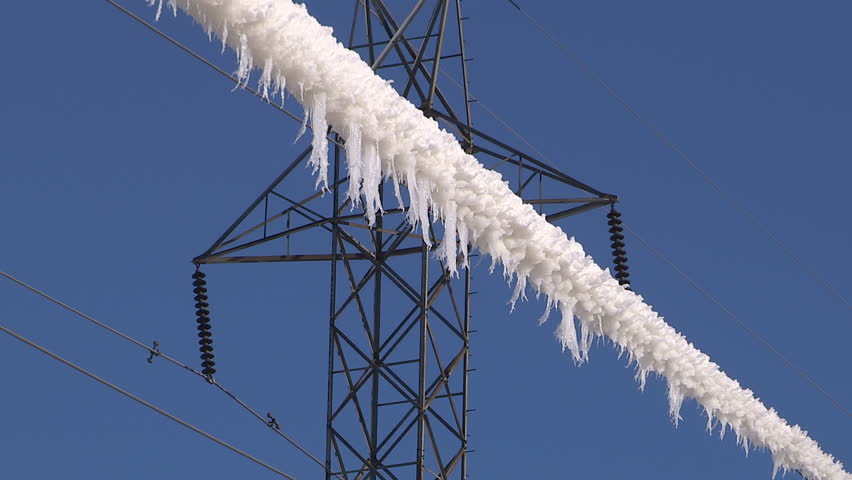 Icicles On Trees And Power Lines That Formed During An Ice Storm Are ...
