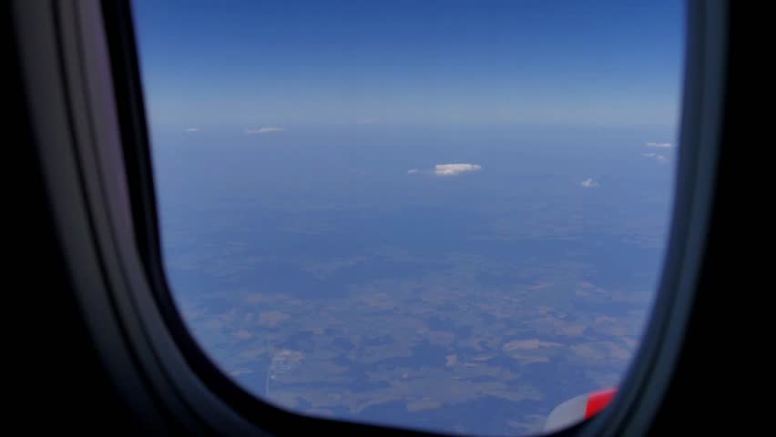 Looking Out The Window Of An Airplane As Clouds Pass By. Stock Footage ...