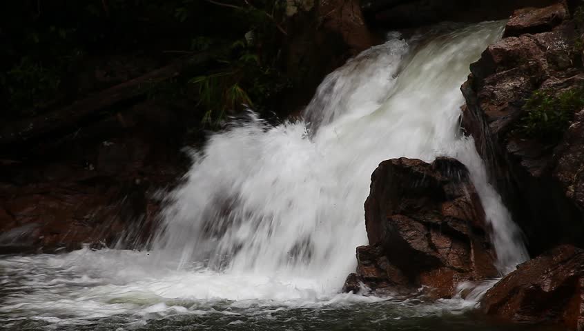 Water Gushing From A Small Waterfall In High Definition (HD) Stock ...