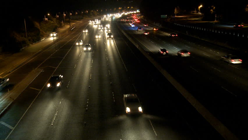 Seamless Loop Time Lapse Of Car Driving On Highway At Night. Stock ...