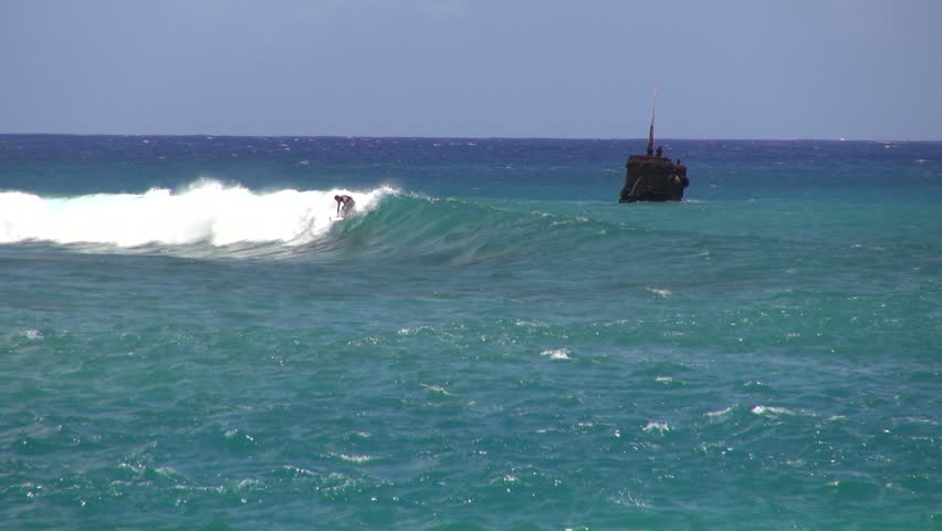 RAROTONGA, COOK ISLANDS - 1/2/2012: A Man Surfing At The Ocean Of Cook ...