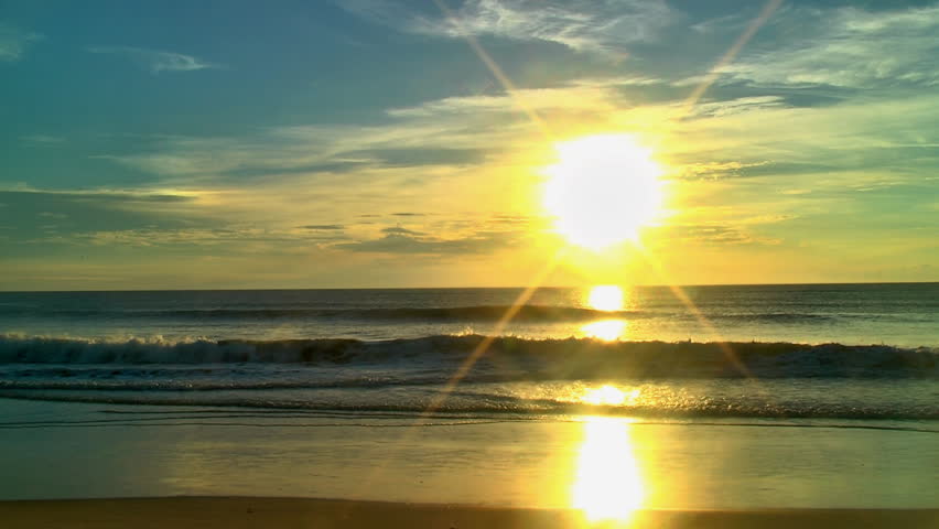 The Sun Rises Over The Atlantic Ocean Along The East Coast Of The ...