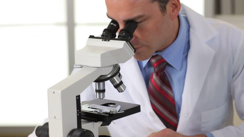 Scientist Looks Into Microscope Stock Footage Video 4588793 - Shutterstock