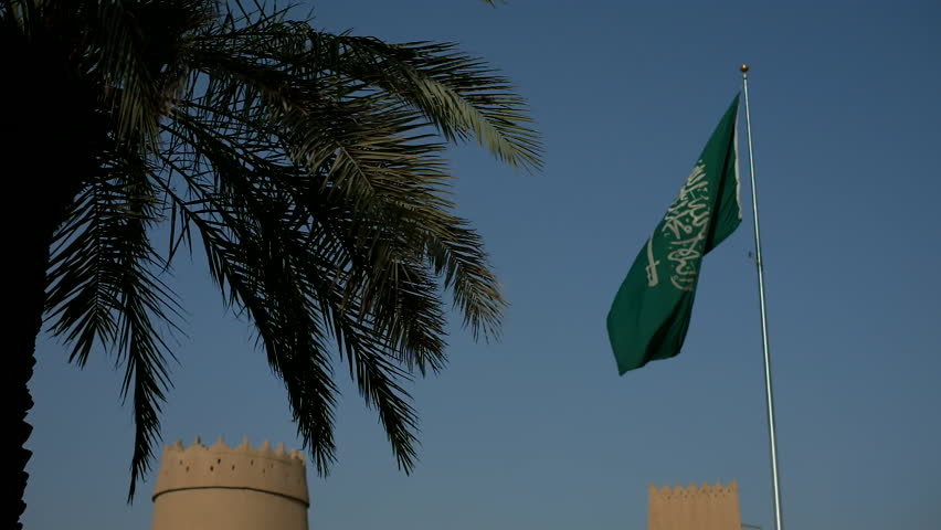 Scene Of Real Flag Of Saudi Arabia With A Dates Palm Tree And Fortress ...