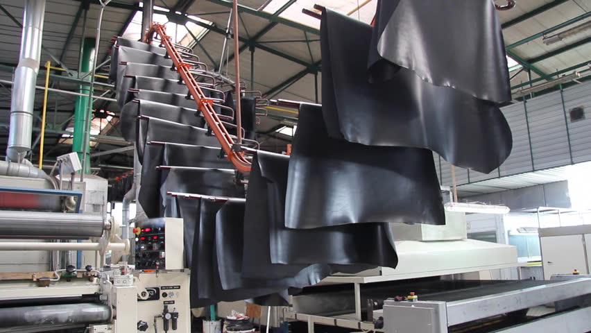 Leather After Staining And Drying Moving On Production Line At The ...