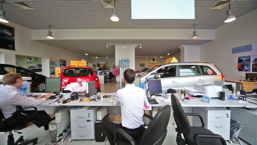 RUSSIA, MOSCOW - AUG 28, 2012 Review Hall With Clients Desk And Cars In ...