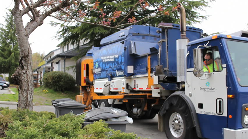 VANCOUVER, BC, JUNE 2015: A New Modern Garbage Truck Comes To Collect ...